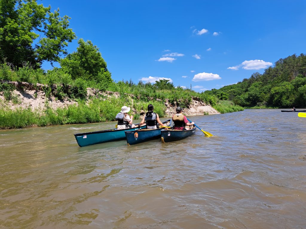 Canoe Floats on Niobrara NSR by Leona - Environment for the Americas